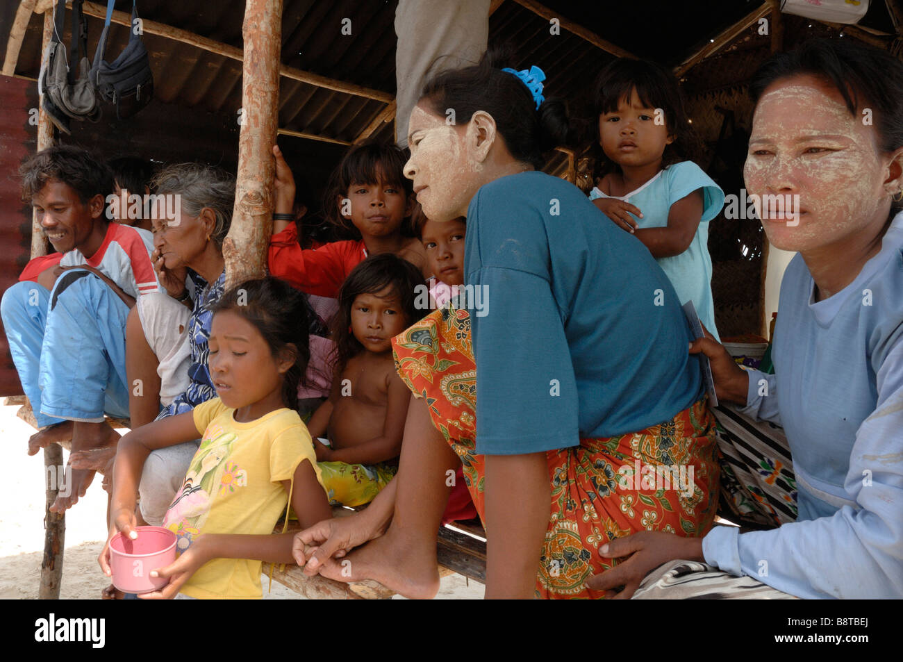 Family group in Bajau house Pulau Mantabuan Semporna Sabah Malaysia ...