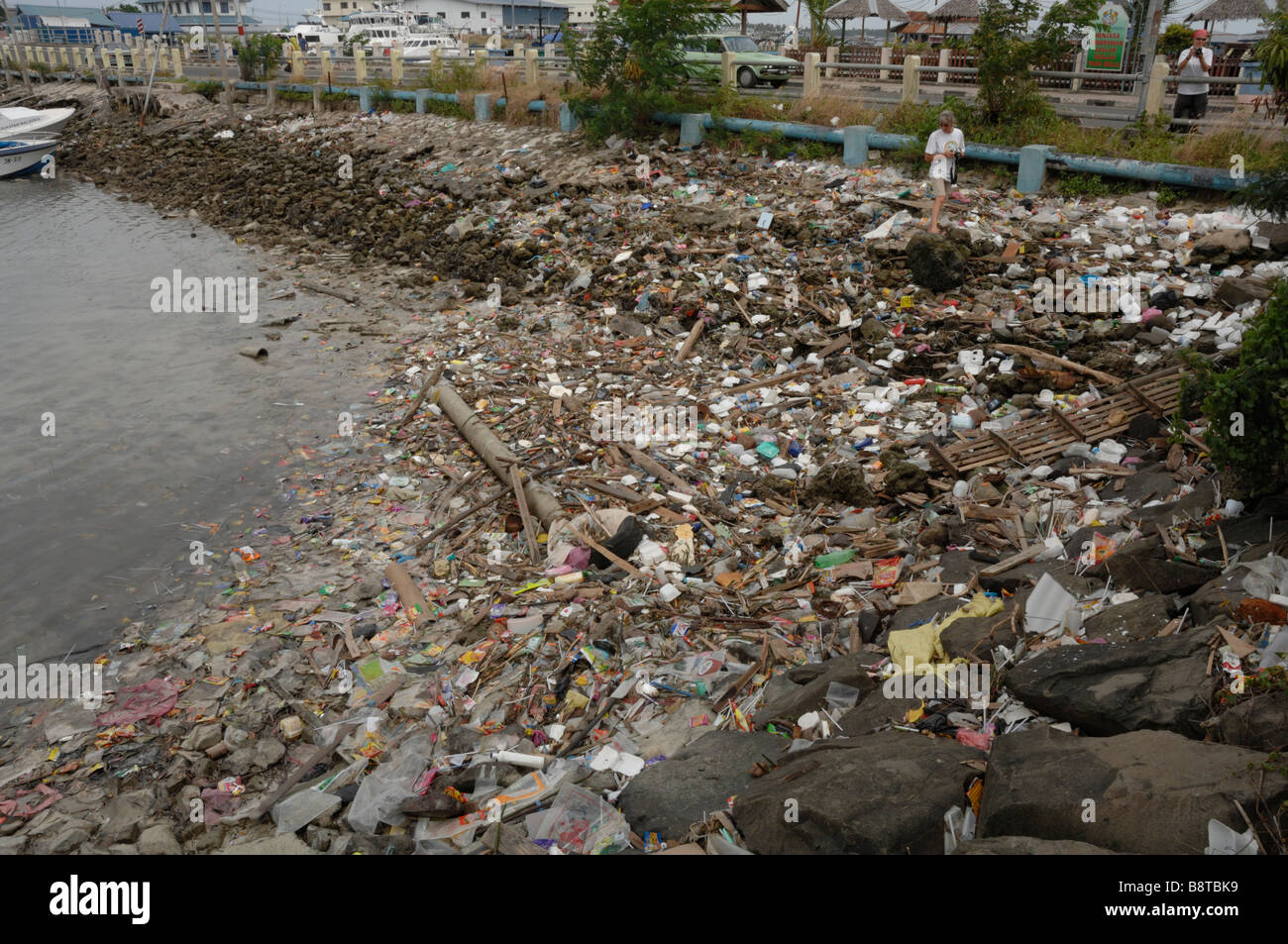 Litter pollution in harbour Semporna Sabah Malaysia Borneo South east ...