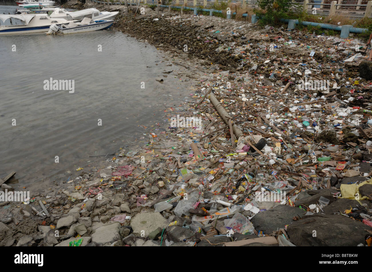 Litter pollution in harbour Semporna Sabah Malaysia Borneo South east ...