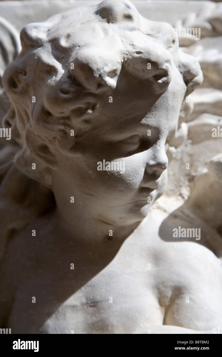 A carved alabaster cherub in the old hill town of Volterra, Tuscany ...