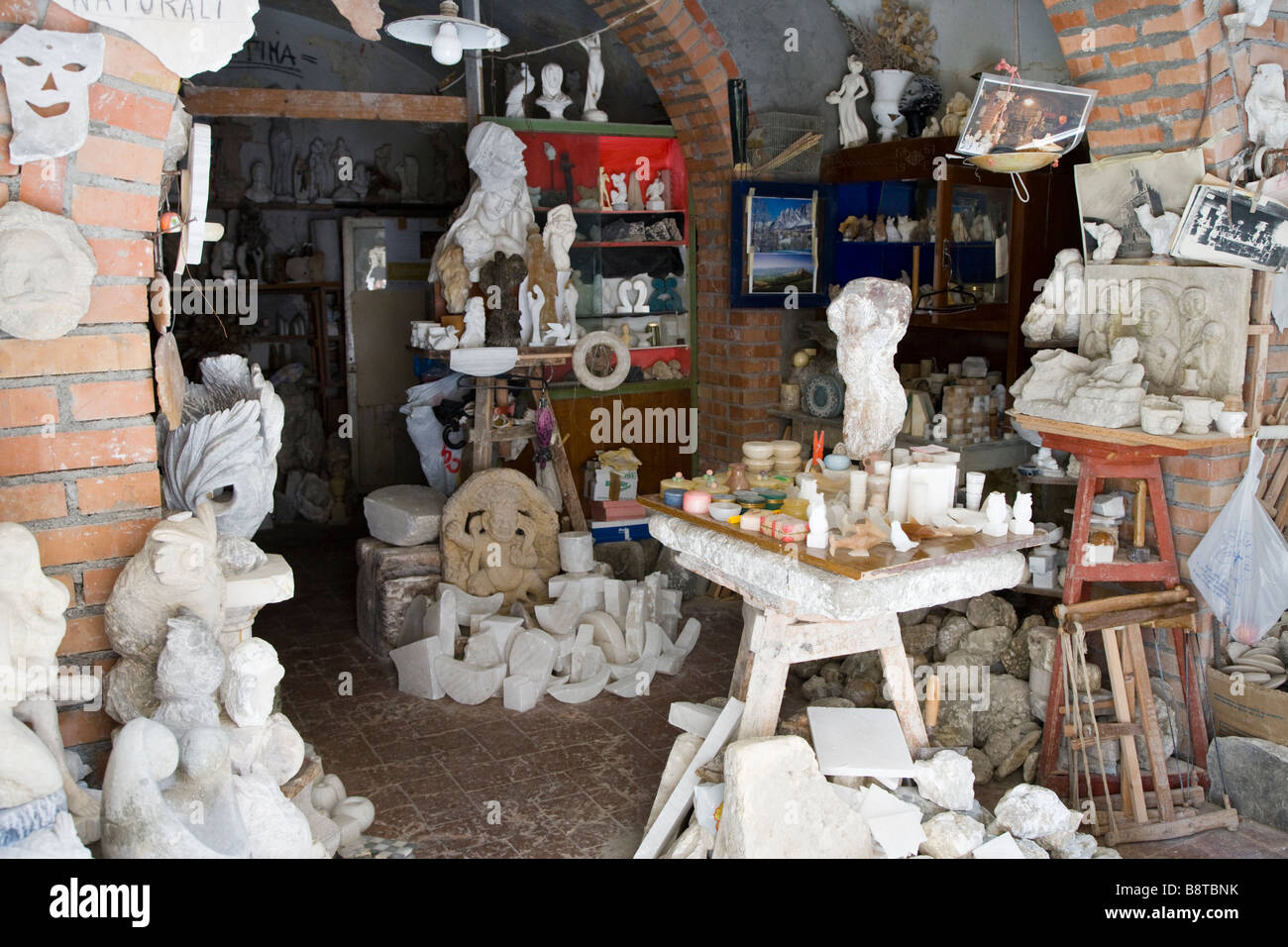 The workshop of an alabaster craftsman in the old hill town of Volterra ...