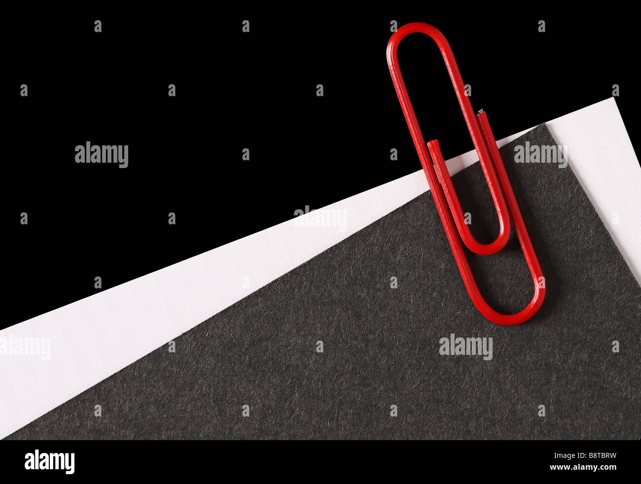 Red paper clip Stock Photo - Alamy