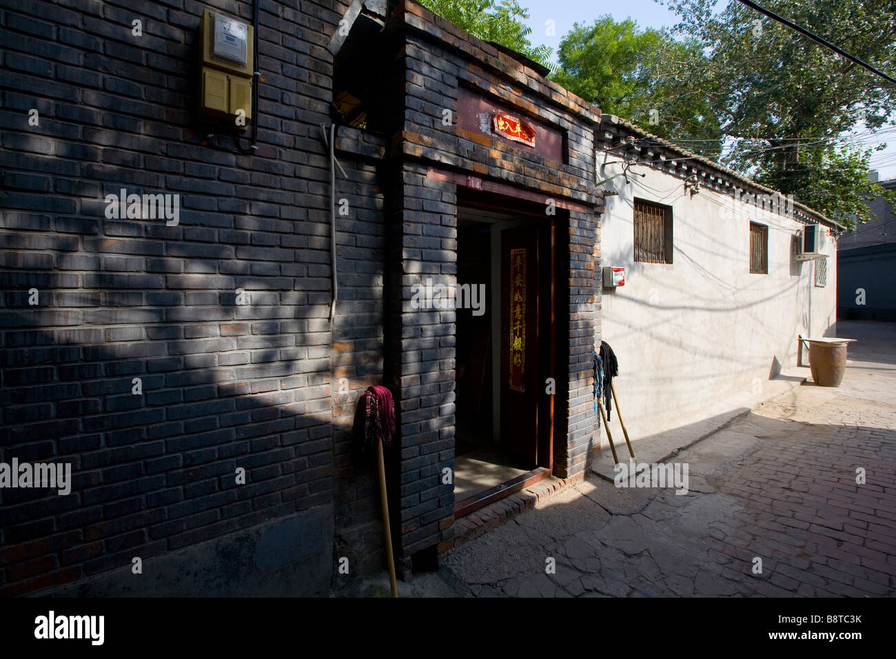 Traditional chinese house in Hutong alley in a preserved old ...