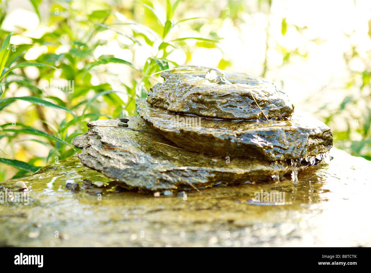 Water Cascading Over Rocks Stock Photo - Alamy