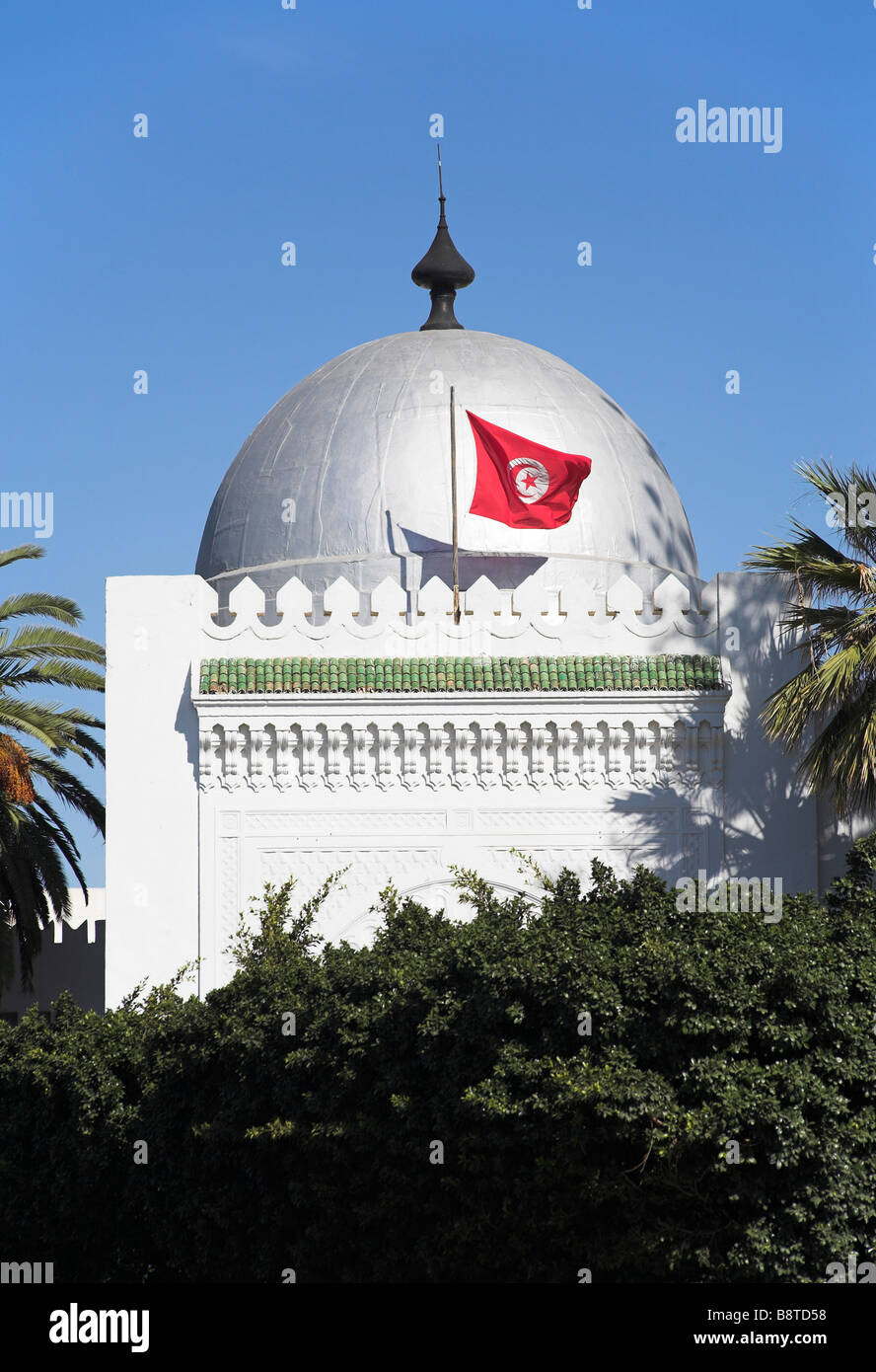 A silver dome and Tunisian flag, Sousse, Tunisia. Dougga, The Tell ...