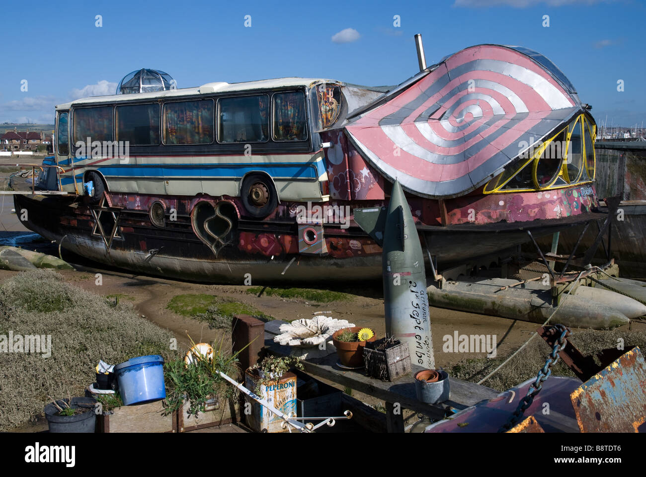 A customized houseboat made of recycled materials at Shoreham Beach ...