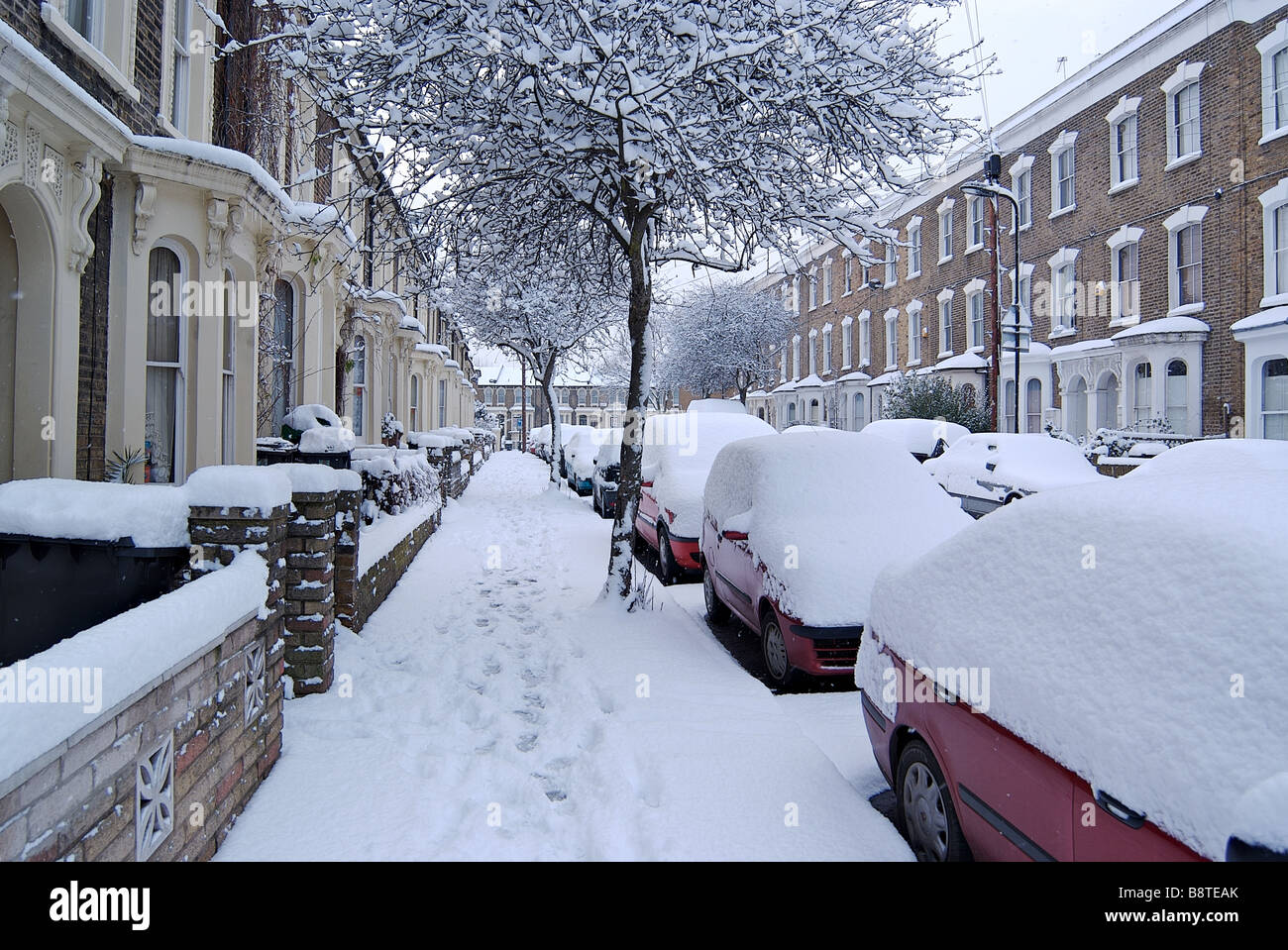 Snow covered street in East London Stock Photo - Alamy