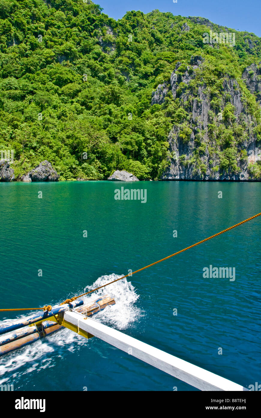 The outrigger of a Filipino bangka (boat) heading for an island in the ...