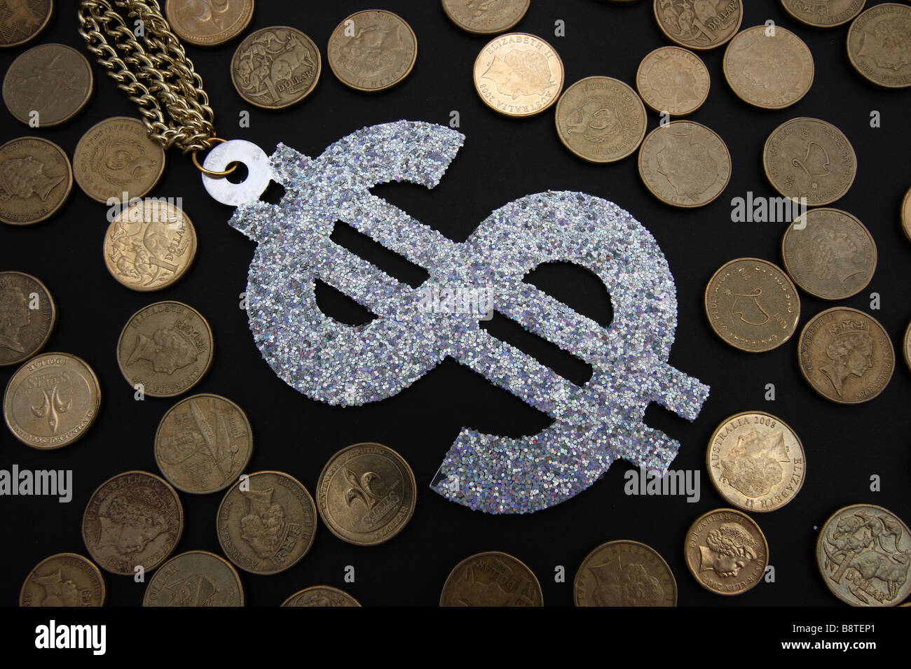 SPARKLING SILVER DOLLAR SIGN SURROUNDED BY GOLD COINS BLACK BACKGROUND ...