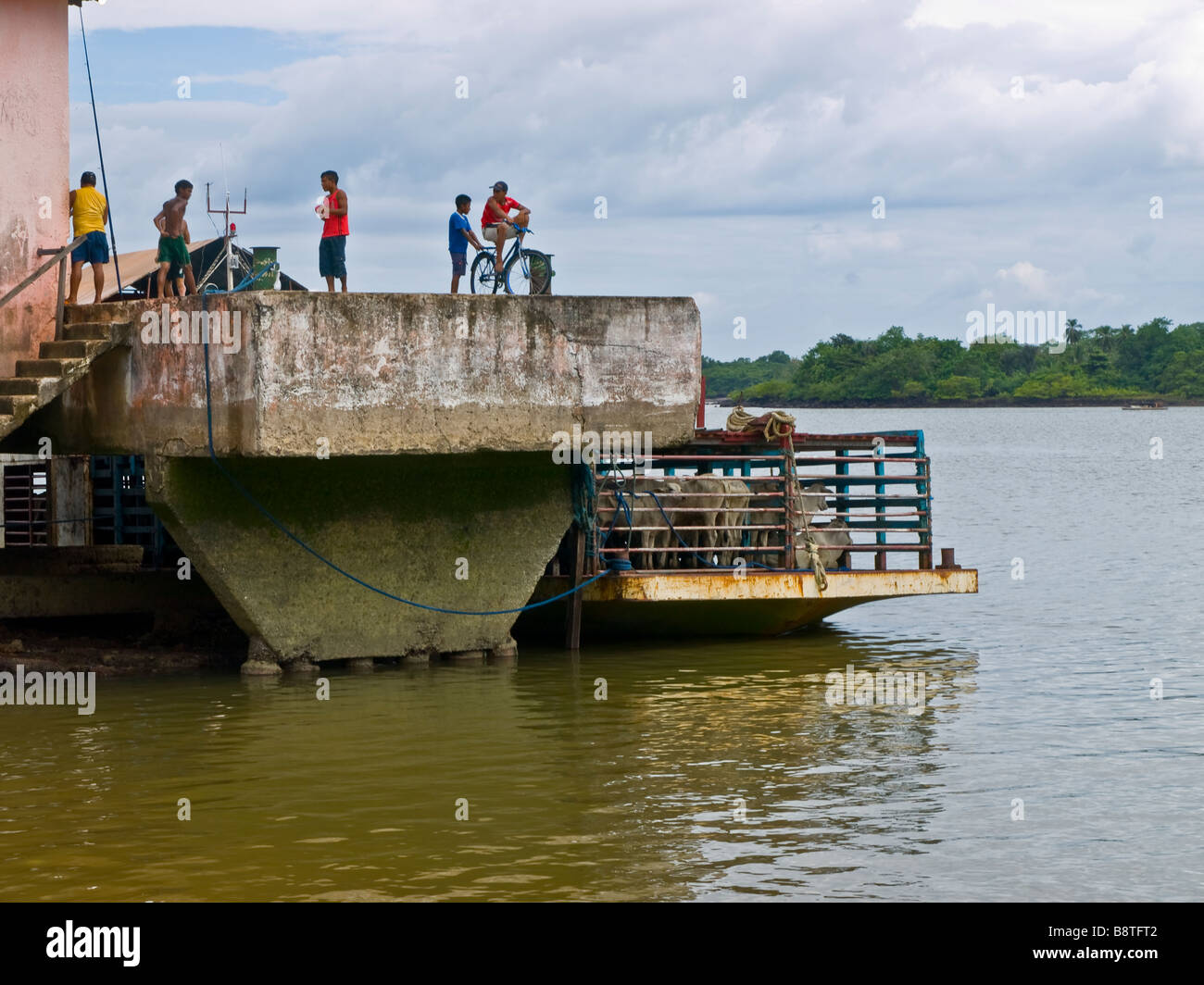 Brazilian youth loitering at a ferry embarcation pier in Soure, Ilha do ...