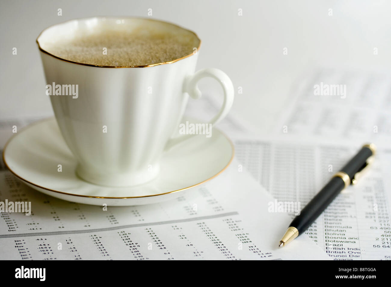 Coffee and accounting Stock Photo - Alamy