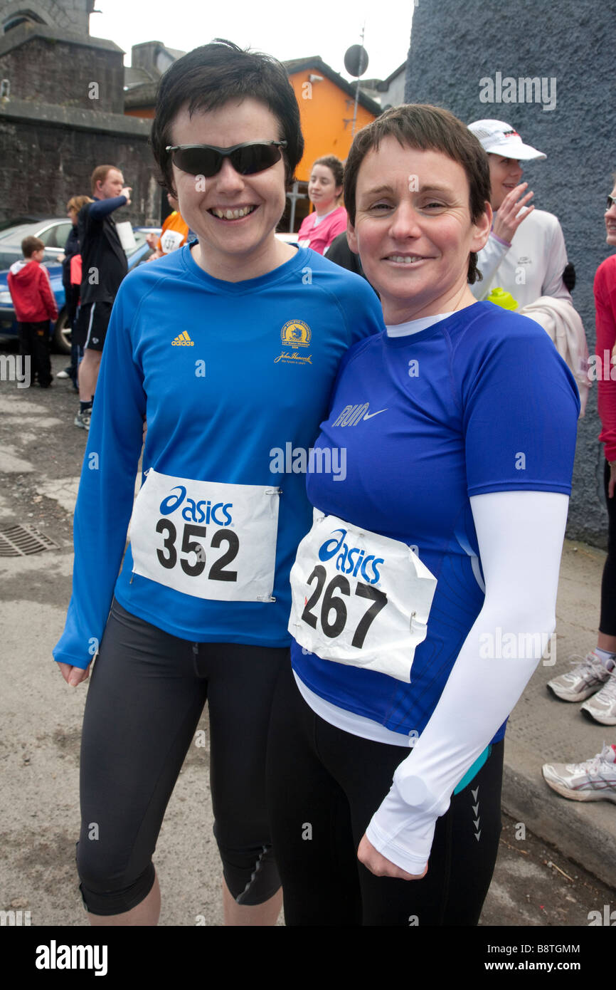 Two female runners before charity fun run, Ireland Stock Photo - Alamy