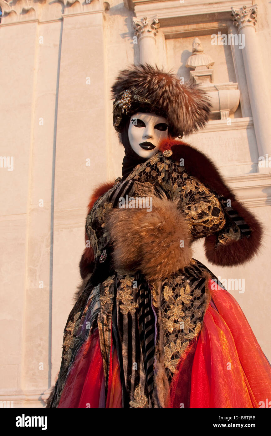 Venice Carnival. 1/2 length girl woman gold red dress hat Costume mask ...