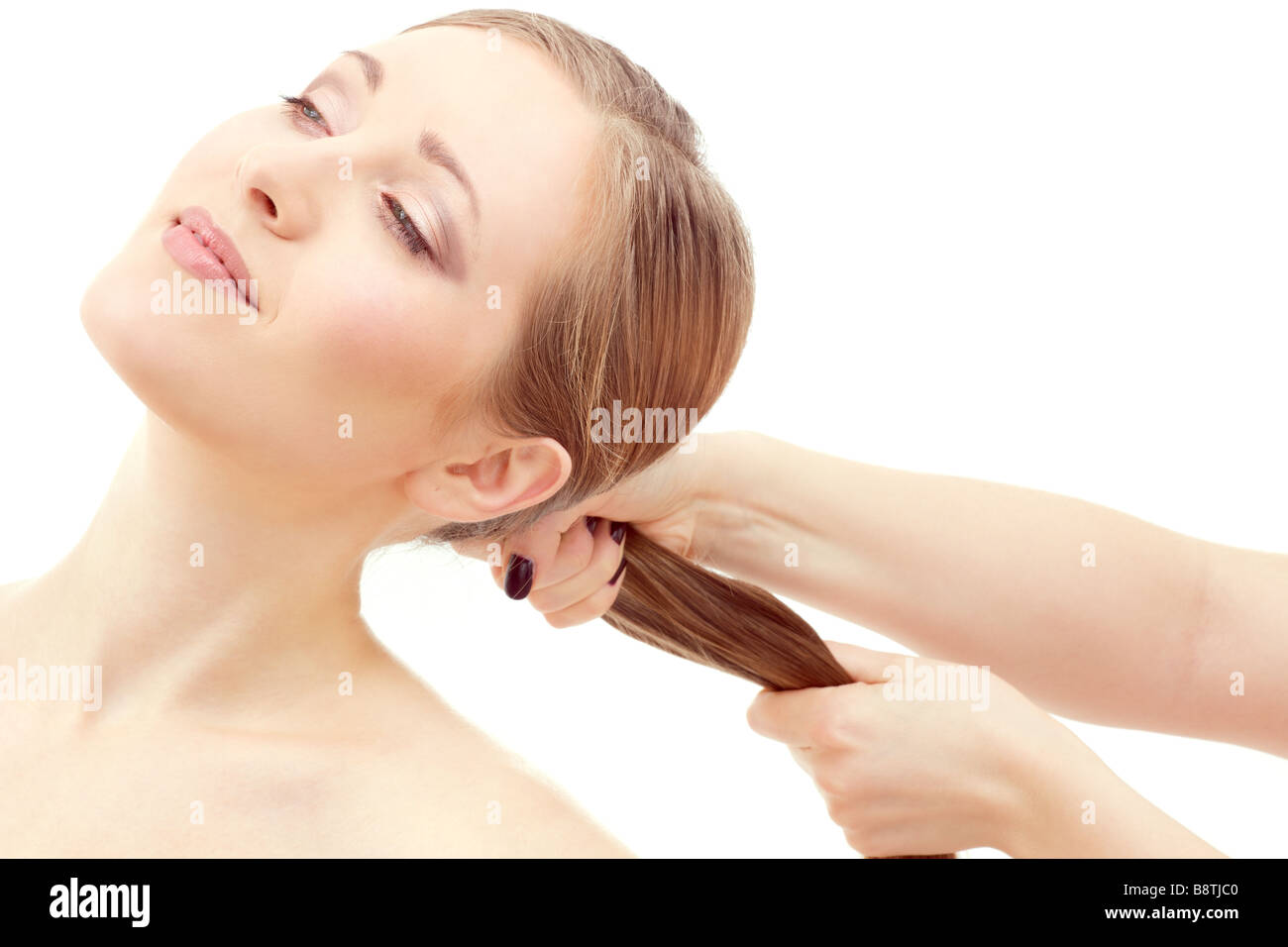 lovely woman face and female hand pulling her hair Stock Photo - Alamy