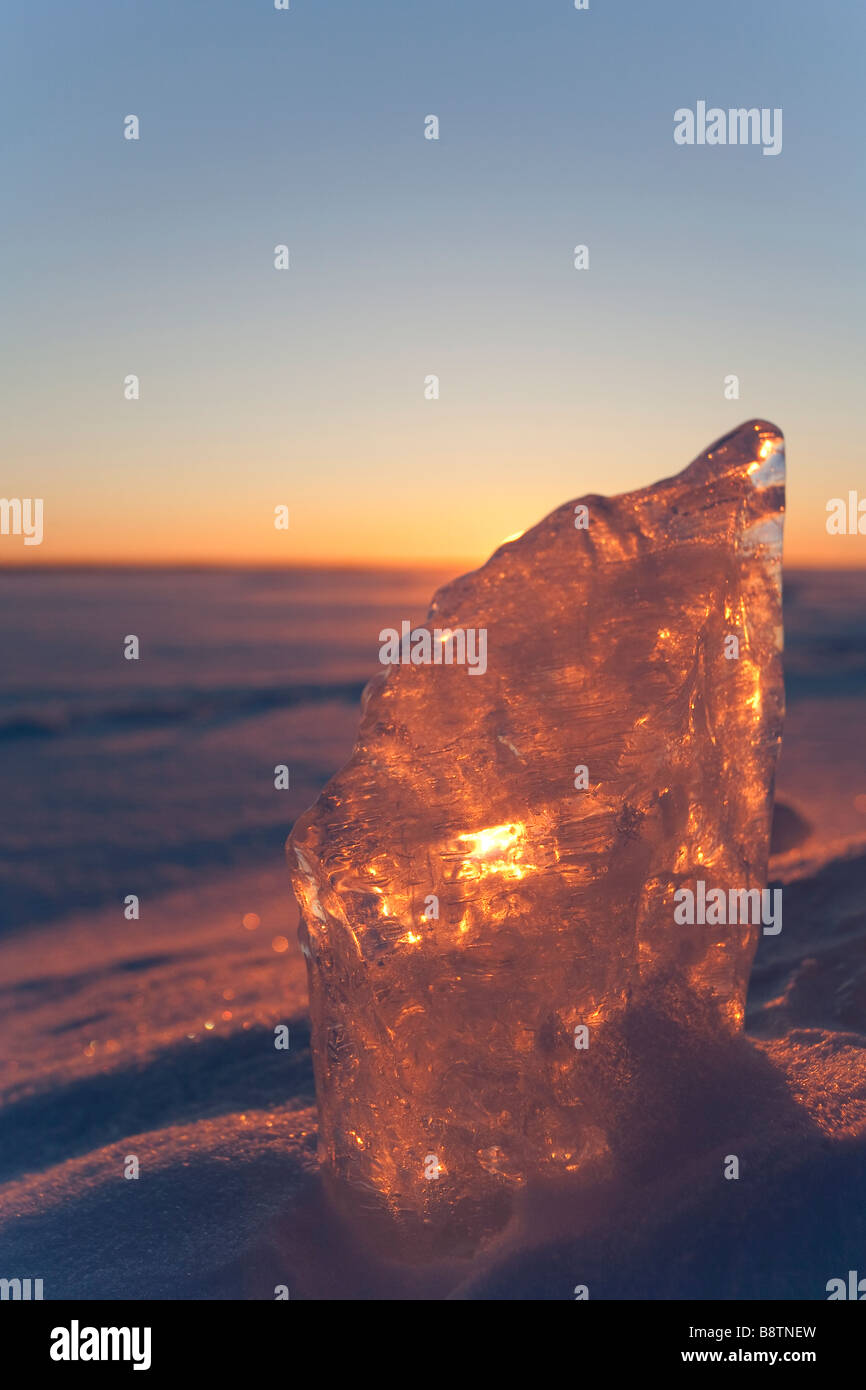 Shiny ice block on sea ice at sunset , Finland Stock Photo - Alamy