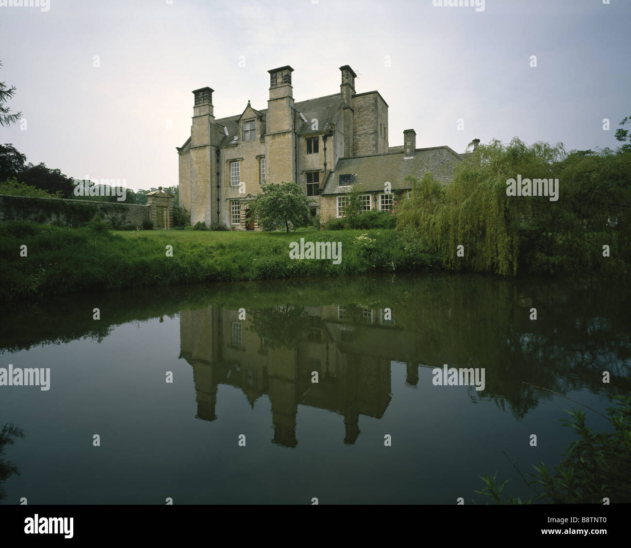 The East Front of Nunnington Hall reflected in the River Rye Stock ...