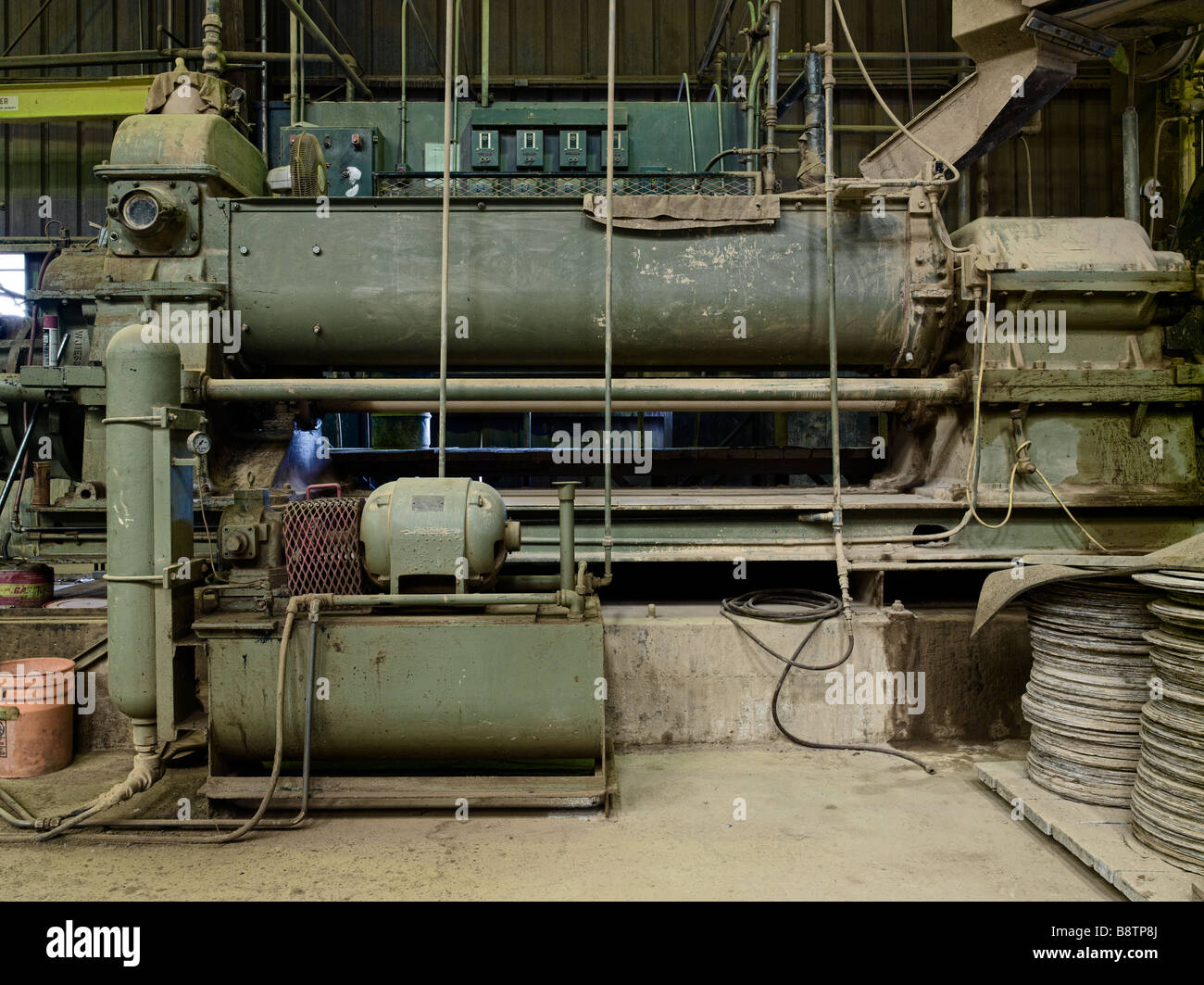 old industrial shop floor with clay extruder Stock Photo - Alamy