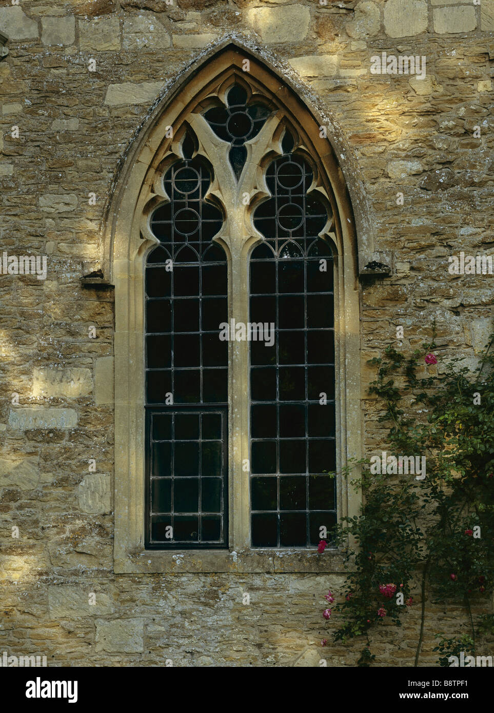 Detail of the window in the West Front of Lacock Abbey Stock Photo - Alamy