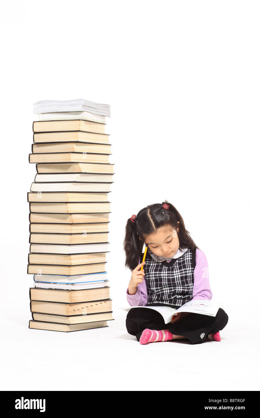 Young Child in Study Stock Photo - Alamy