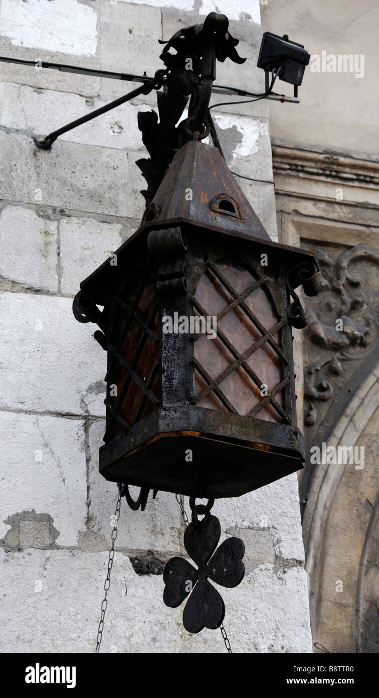 rustic old style street lamp light lighting with a shamrock on side of ...