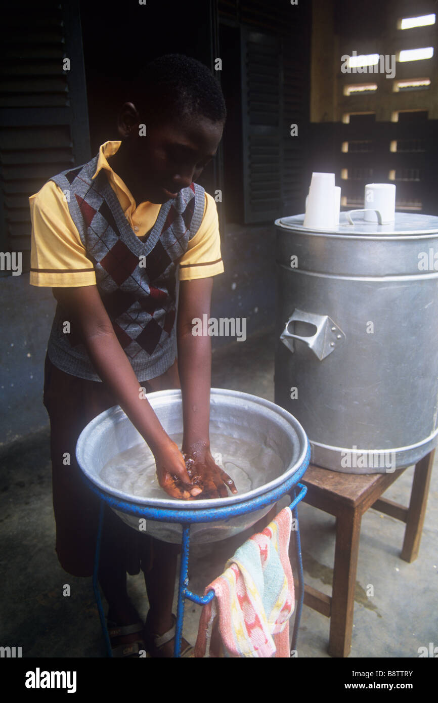 Girl washing hands basin hi-res stock photography and images - Alamy