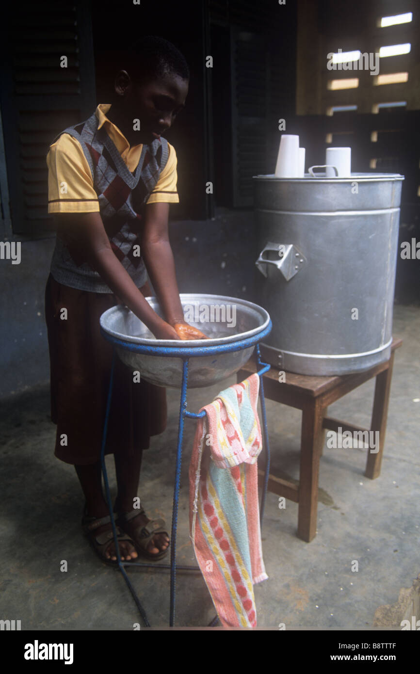 Schoolgirl washing her hands Ghana Stock Photo - Alamy