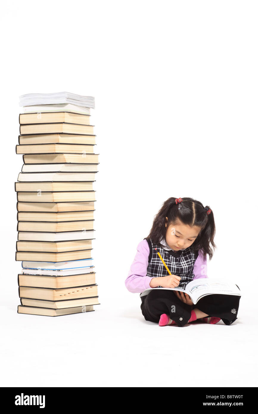 Young Child in Study Stock Photo - Alamy