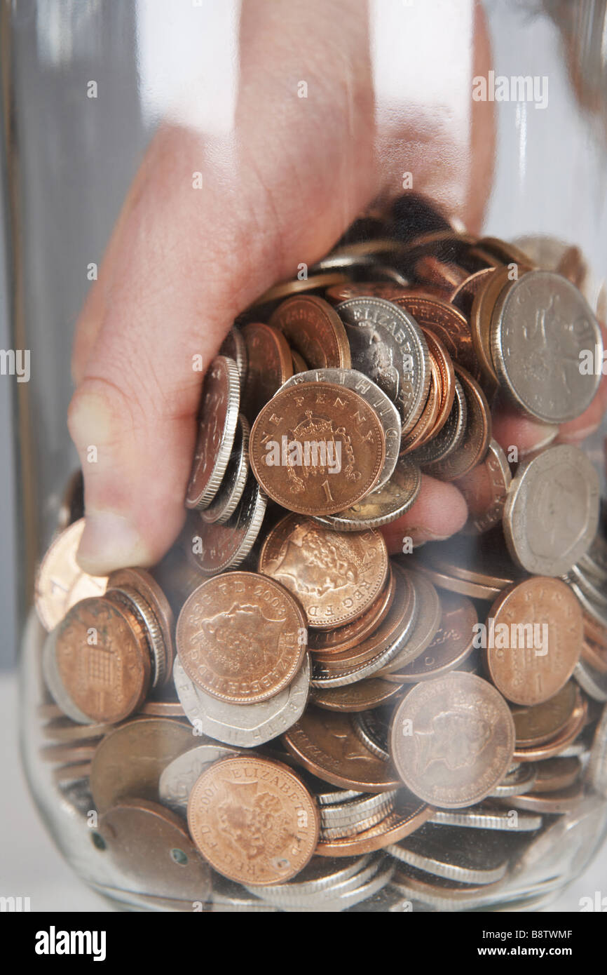 Glass jar full of money hi-res stock photography and images - Alamy