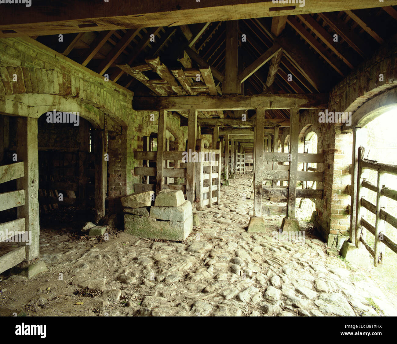 Interior of delightful old stabel block with cobbled floor at ...