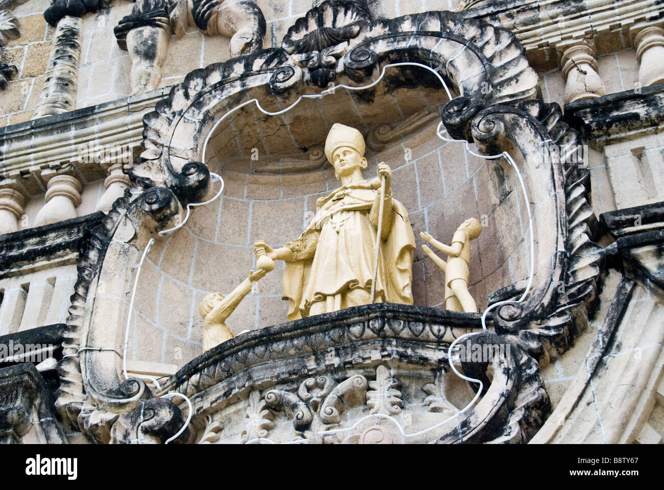 Detail of Miagao Church, Iloilo, Philippines -- statue of bishop Stock ...