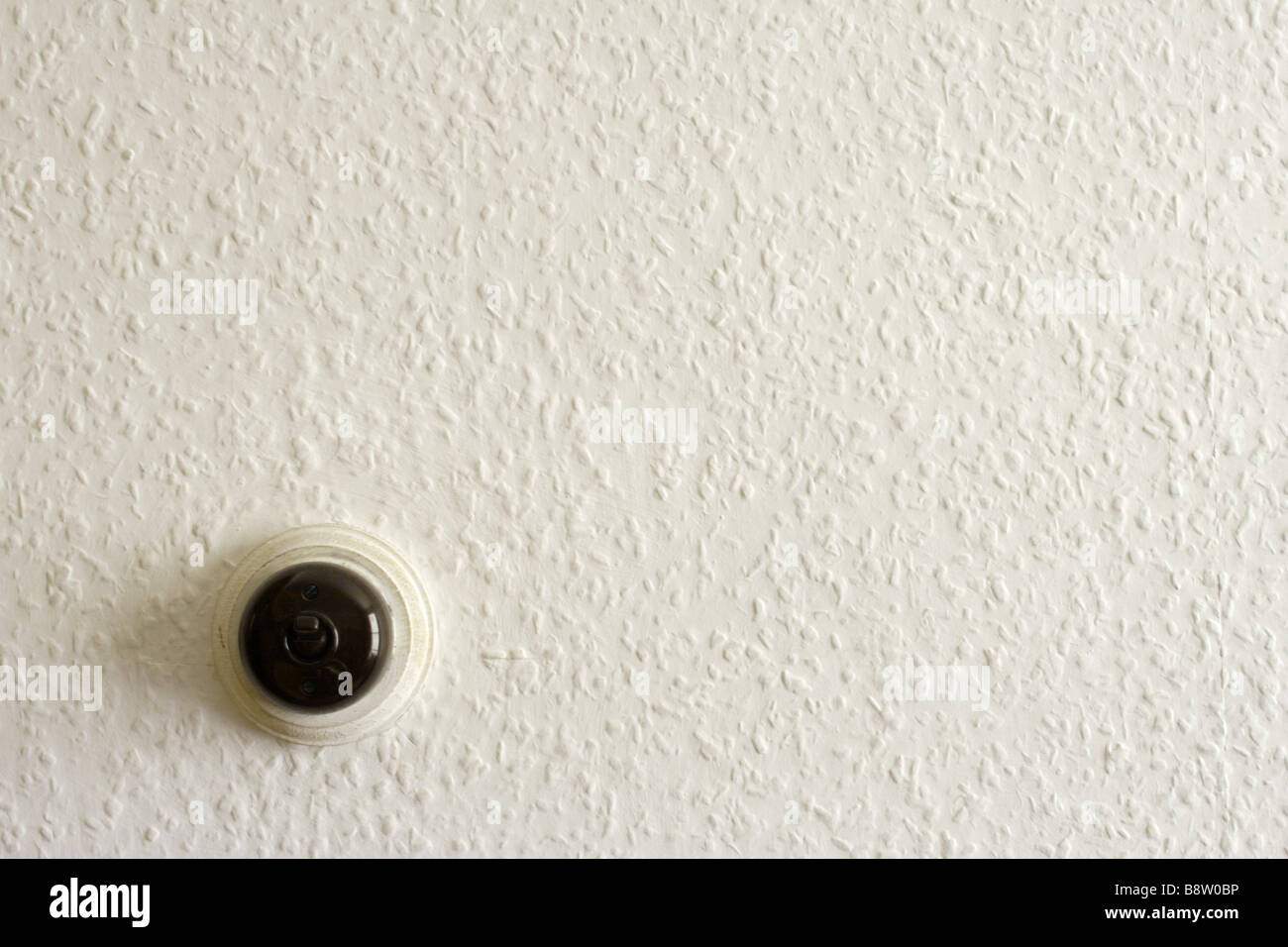 Circular light switch in the upper rooms of the 1970s tailor s shop in ...