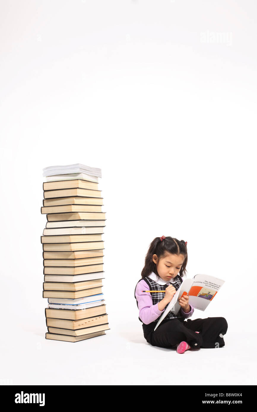 Young Child in Study Stock Photo - Alamy