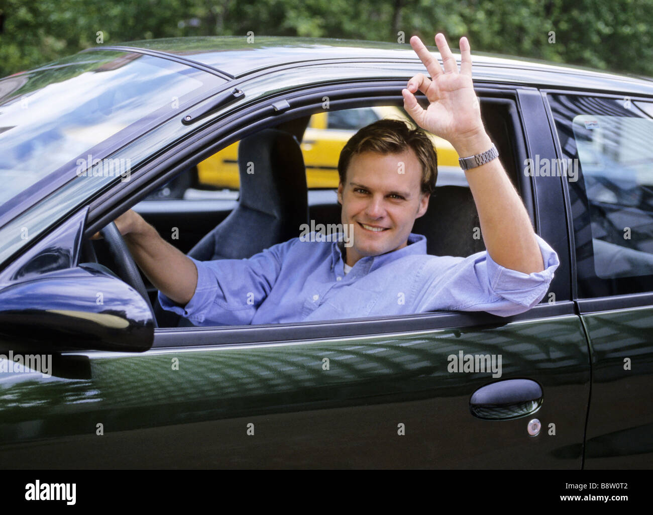 Polite man driver Stock Photo - Alamy
