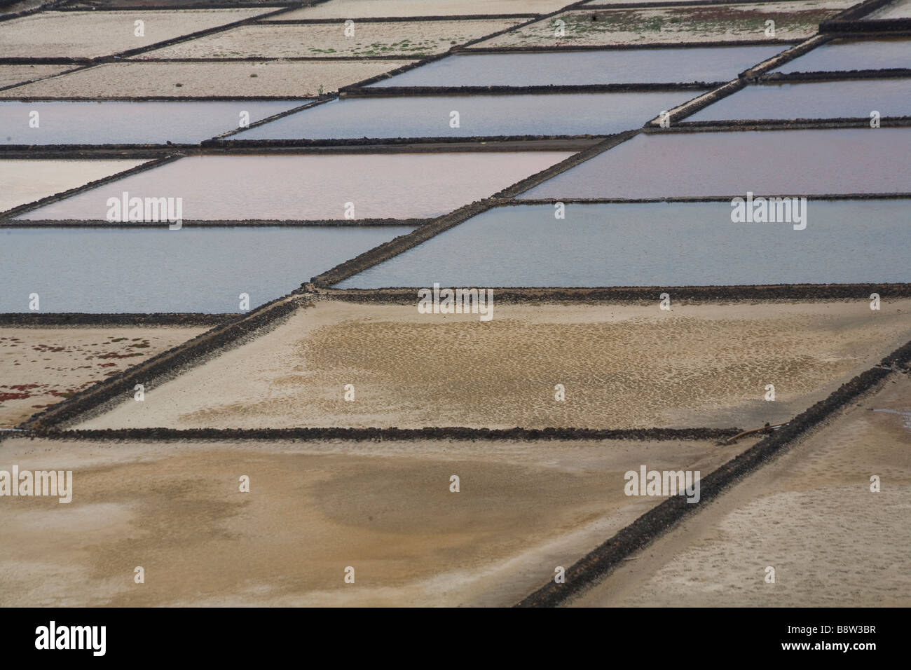 Geometric salt evaporation pools in Salinas de Janubio saltmine in ...