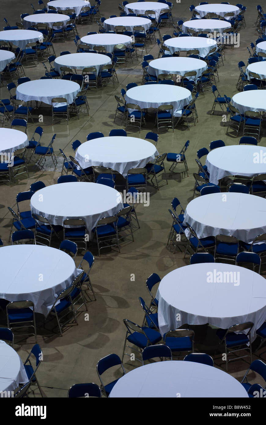 Rows of empty tables and chairs Stock Photo - Alamy