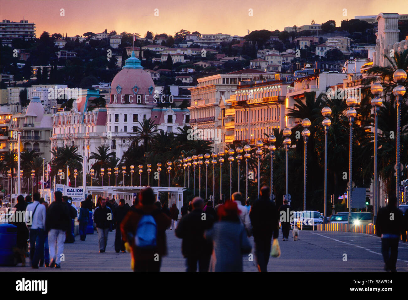 People walking on the Promenade des Anglais in winter time Stock Photo ...