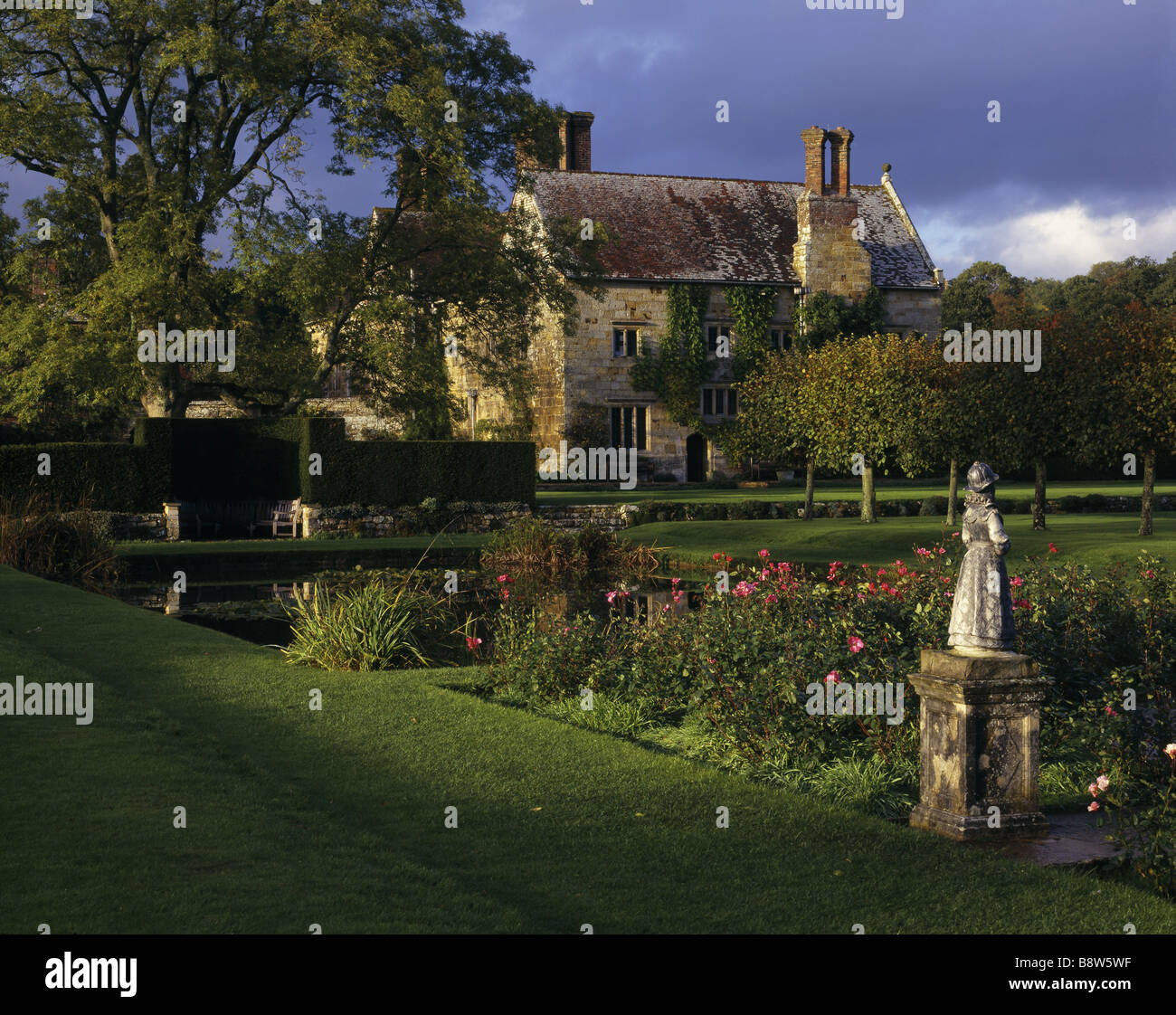 The south front of Bateman s seen from the garden walk beyond the ...