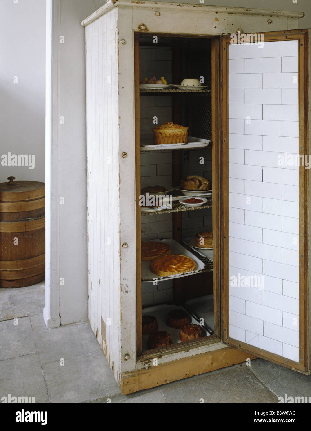 The Meat Safe in the Larder. The door is open showing several food ...