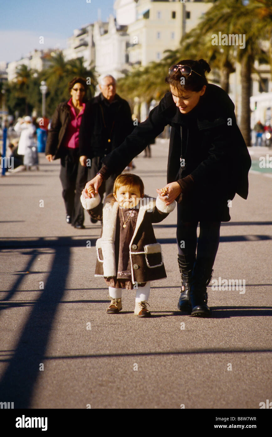 First steps of Faustine with her mum on the promenade des Anglais in ...