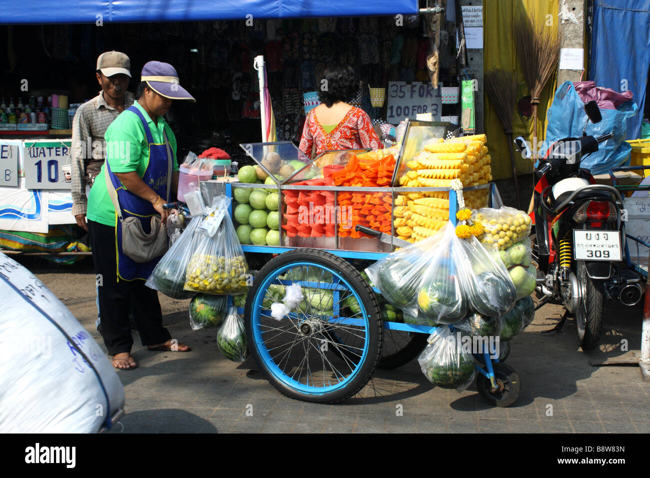 Fruit merchant at Chatuchak Weekend Market , Bangkok , Thailand Stock ...