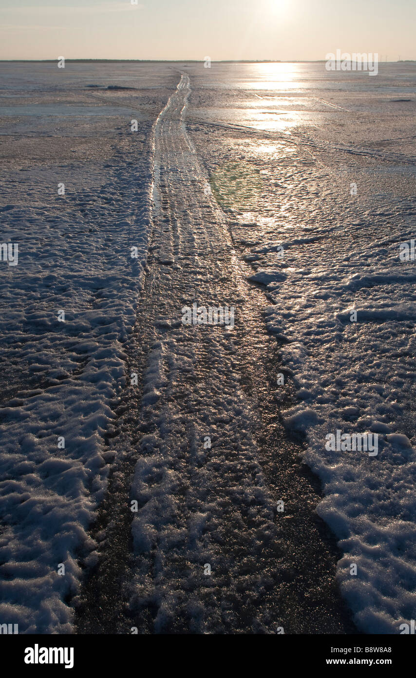 Frozen snowmobile tracks on sea ice , Finland Stock Photo - Alamy