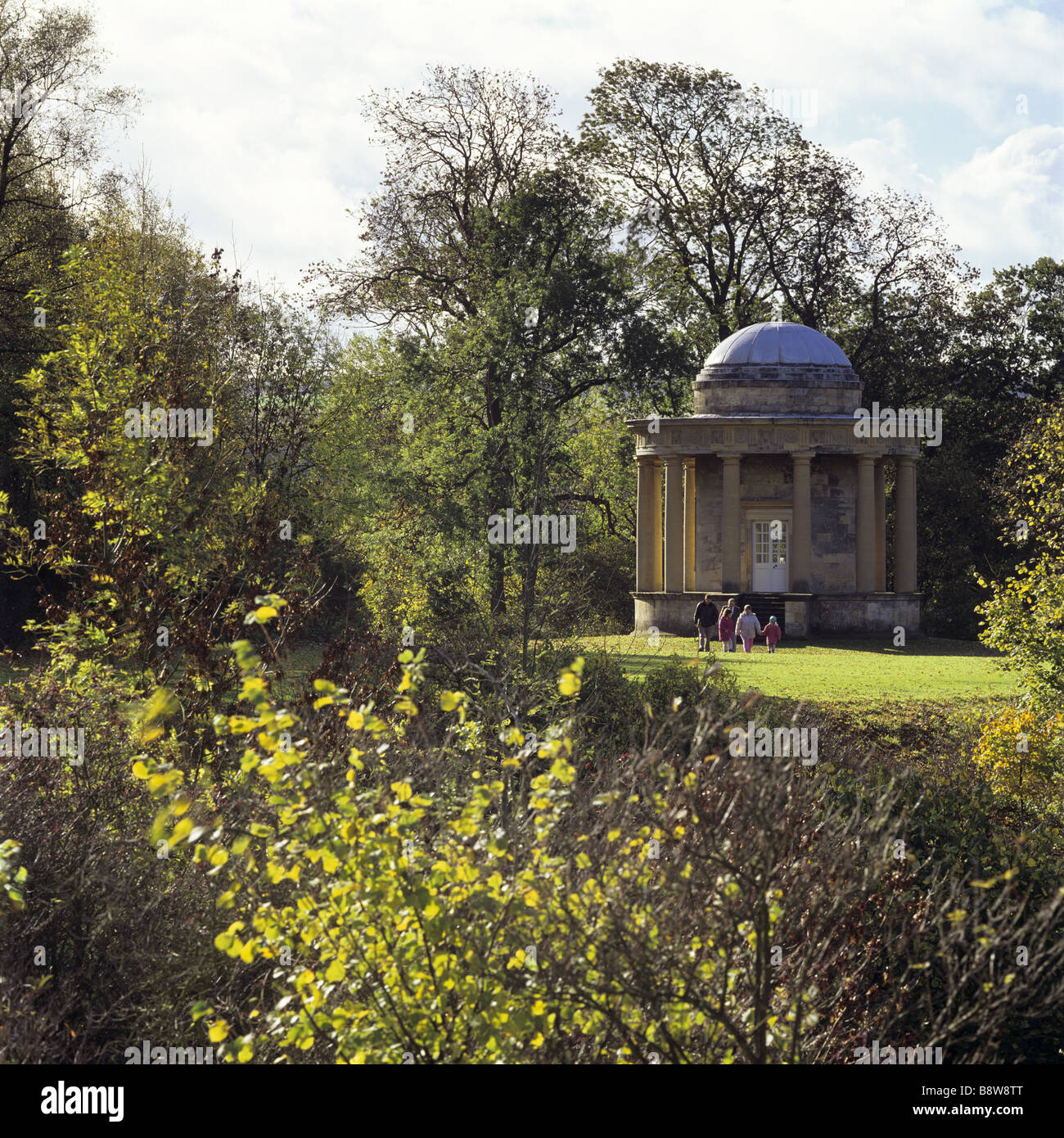 The circular Tuscan Temple with visitors glimpsed from along Rievaulx ...