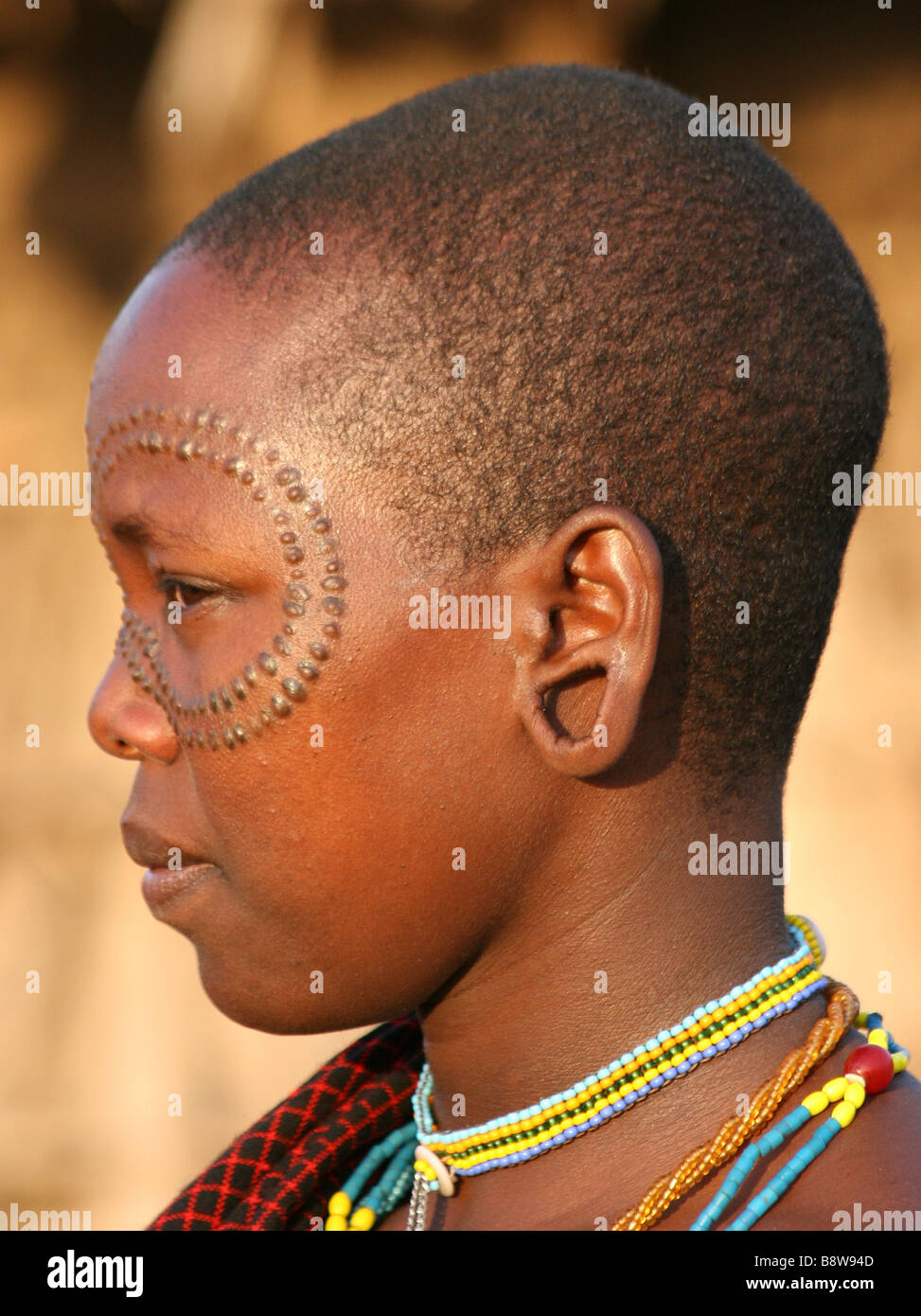 Africa Tanzania members of the Datoga tribe Woman in traditional dress ...