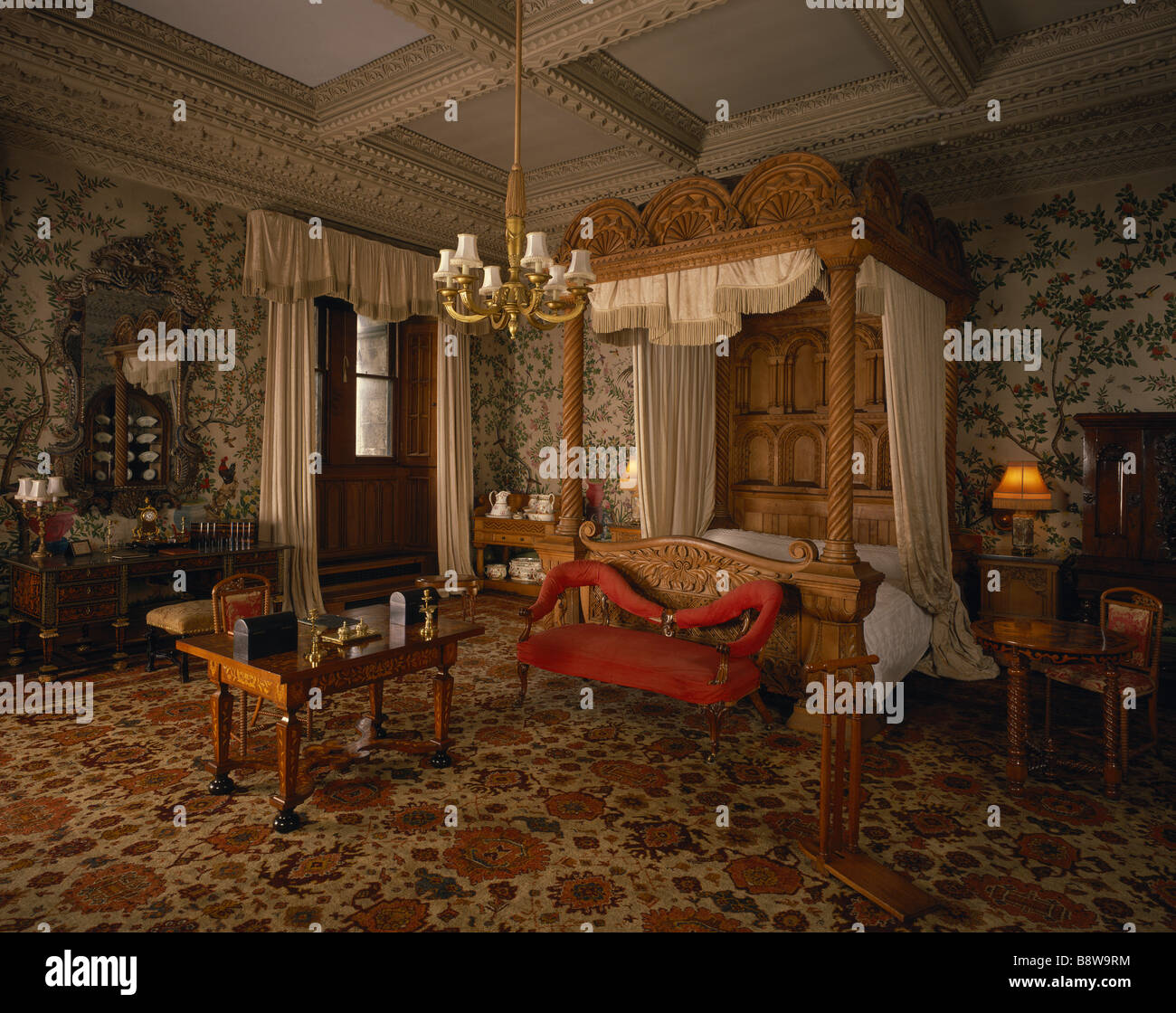 The State Bedroom at Penrhyn Castle showing a massive carved oak bed ...