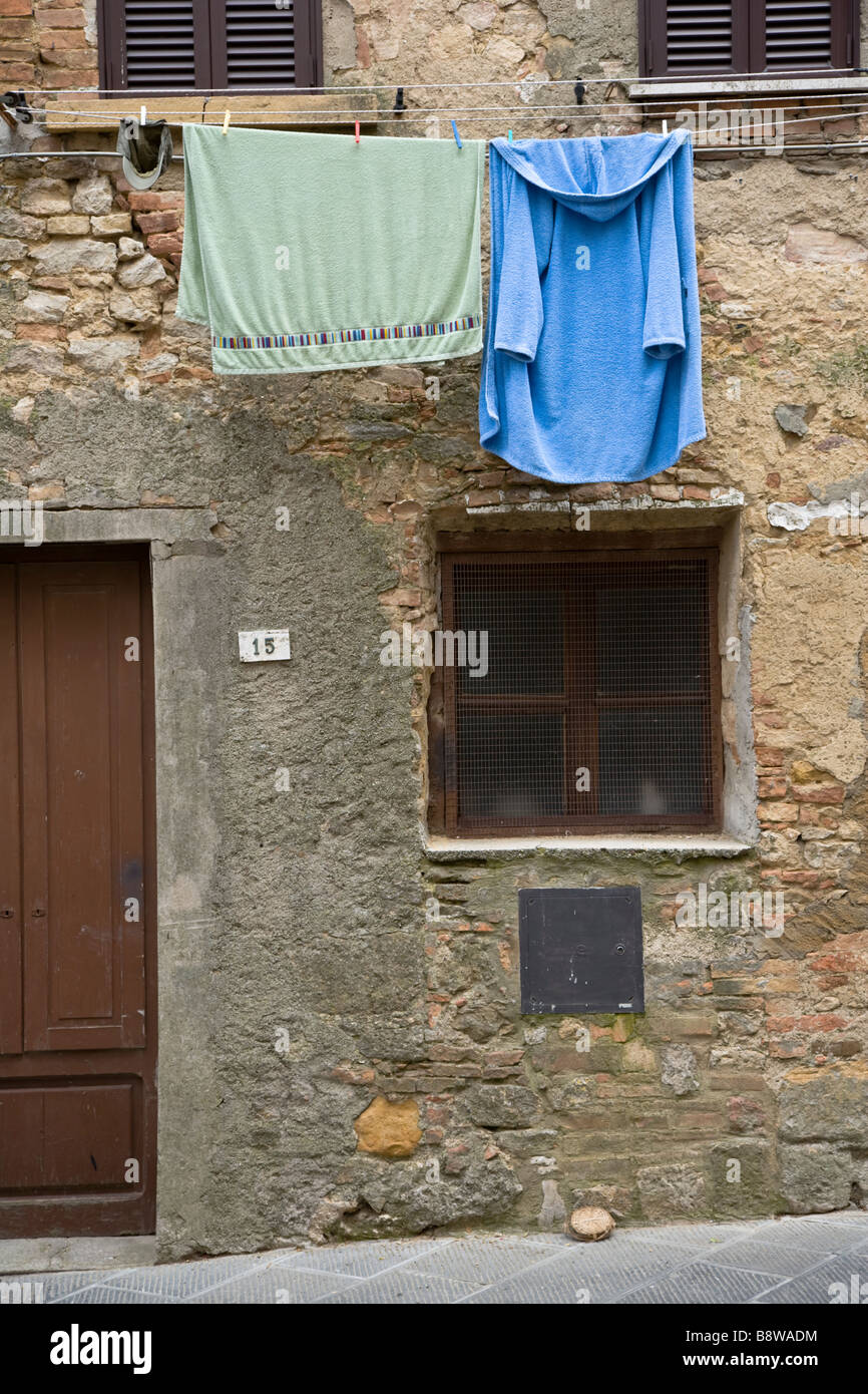 Washing lines in the back streets of Volterra, Tuscany, Italy Stock ...