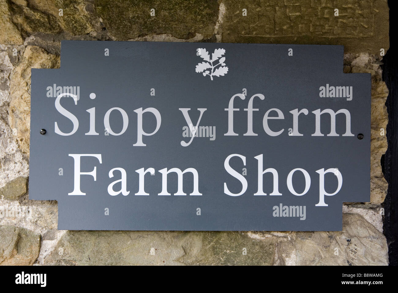 The Farm Shop sign at Chirk Castle Wrexham Wales in Welsh and English ...