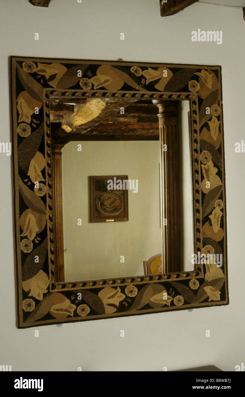A view showing the mirror with a canvas work frame in the Hall at Monk ...