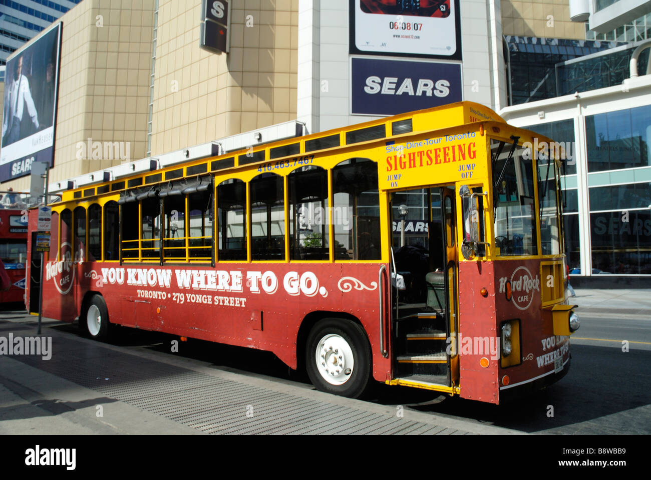 Tour Bus in Dundas Square in Toronto Canada Stock Photo - Alamy