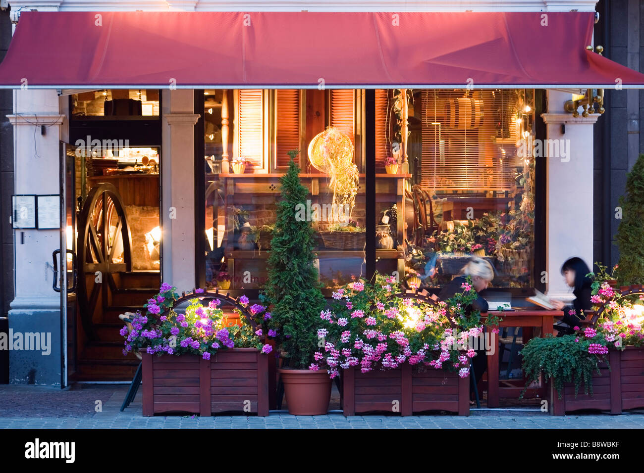 Riga, Latvia, Europe. tourists at a restaurant cafe, Kungu Street, old ...