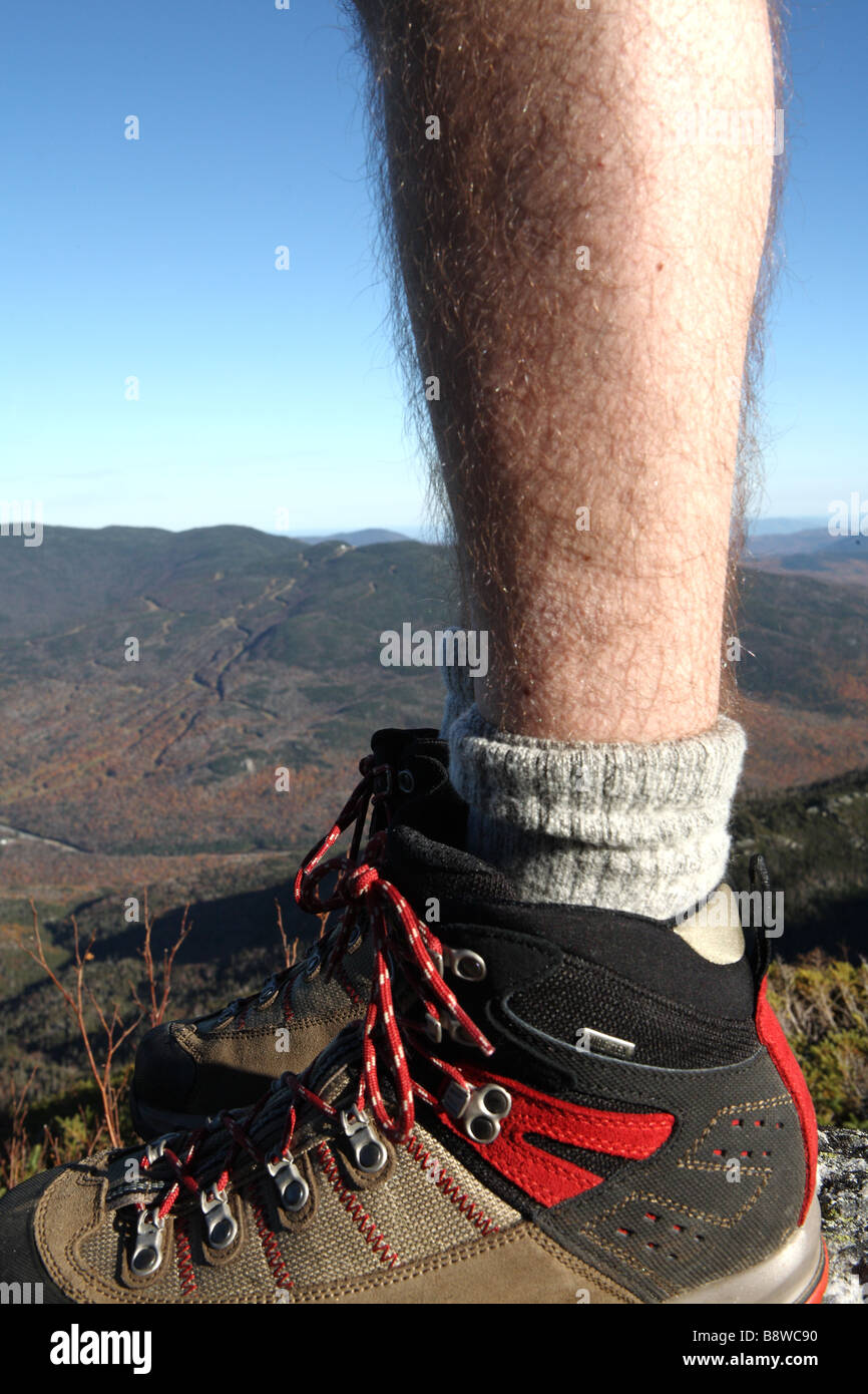 Legs, hiking shoes, and mountains Stock Photo - Alamy